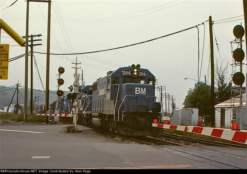 B&M GP38-2's 206 and 208 at the crossing